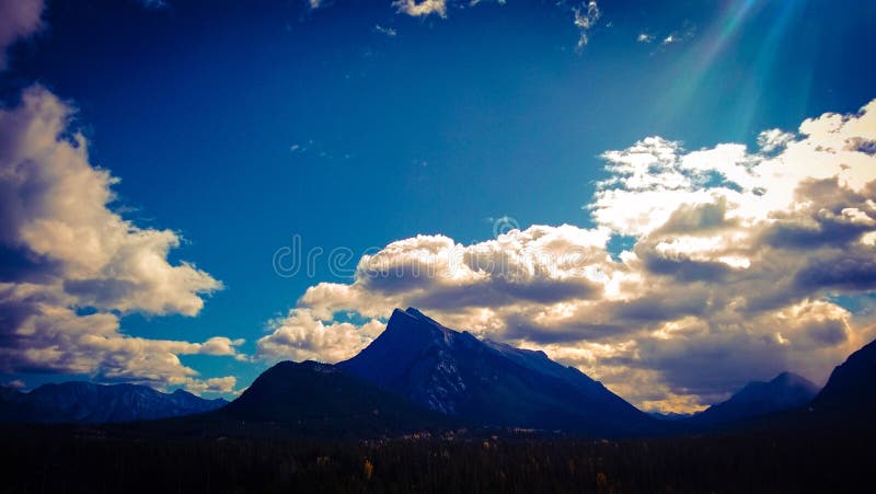 Mountain Storm Rolling Over Sunlight Stock Photo - Image of fenlands ...
