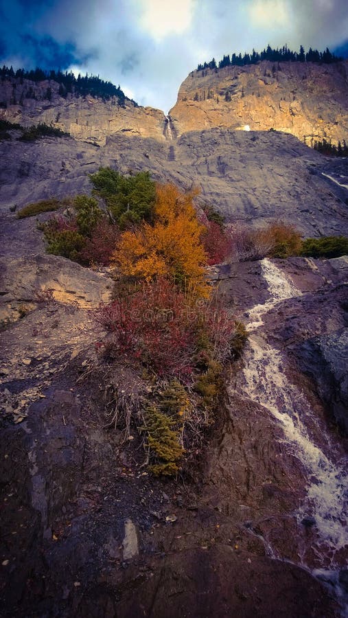 Mountain Storm Rolling Over Sunlight Cascde Waterfall Stock Photo ...