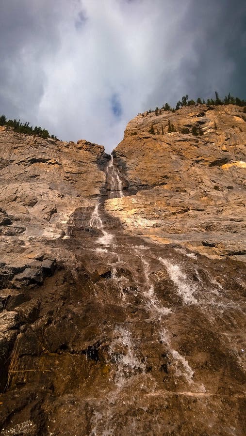 Mountain Storm Rolling Over Sunlight Cascde Waterfall Stock Image ...