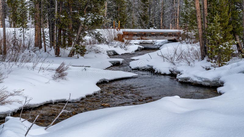 Mountain Stream Flow Beneath a Bridge in Winter Stock Photo - Image of ...