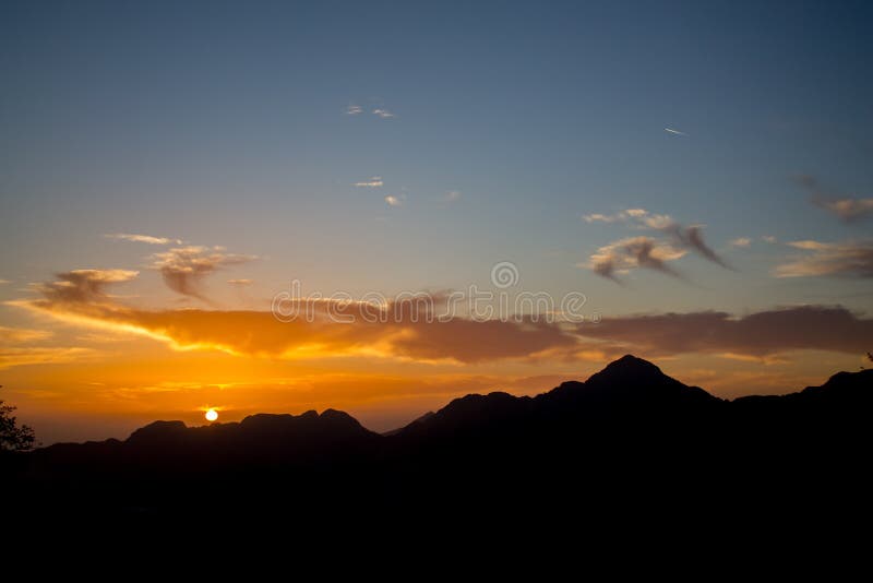 Mountain at sunset stock photo. Image of mountain, mountains - 214320728