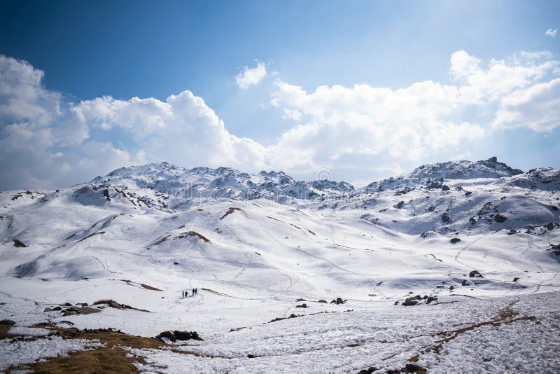 Mountain Top Covered by a Thick Layer of Snow Stock Photo - Image of ...