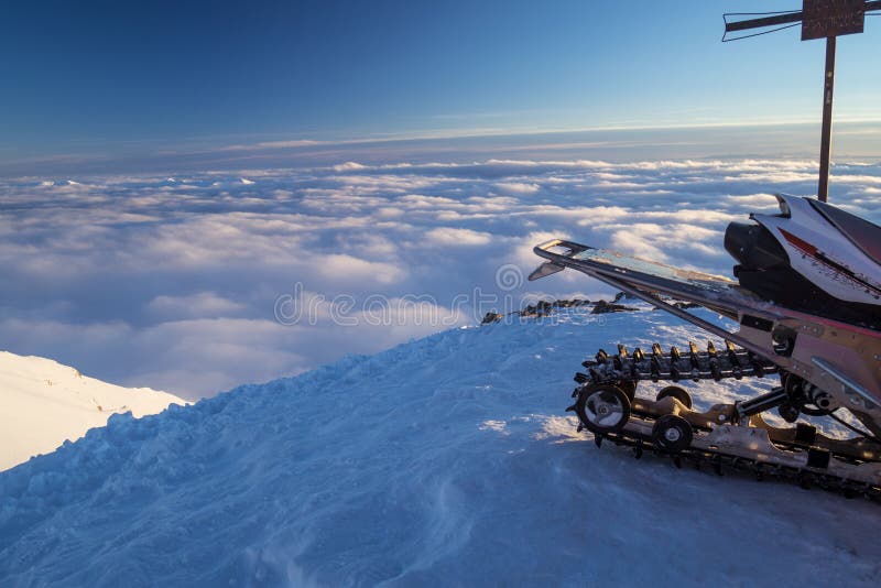 Snowmobile in mountains stock photo. Image of view, snowmobile - 79550540