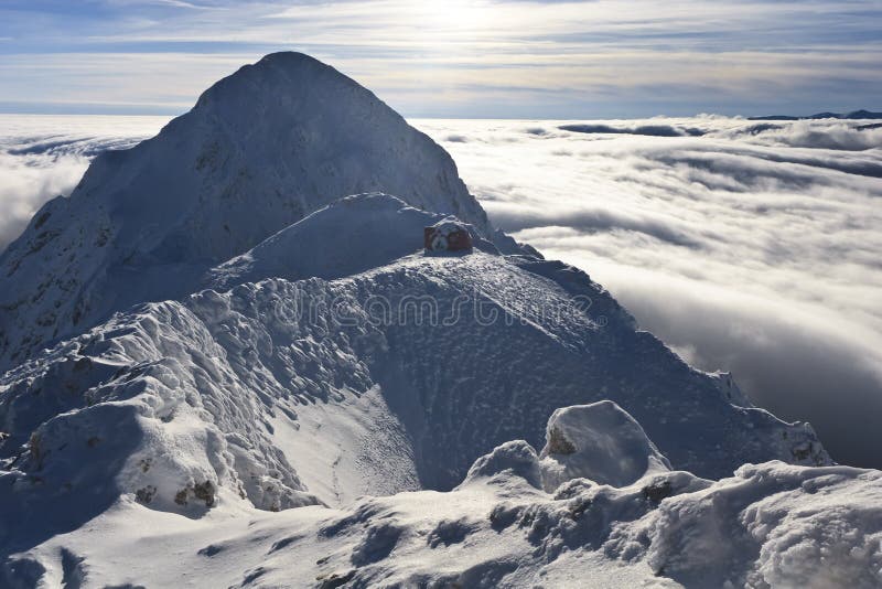 Mountain top in winter stock photo. Image of tourism - 17446312