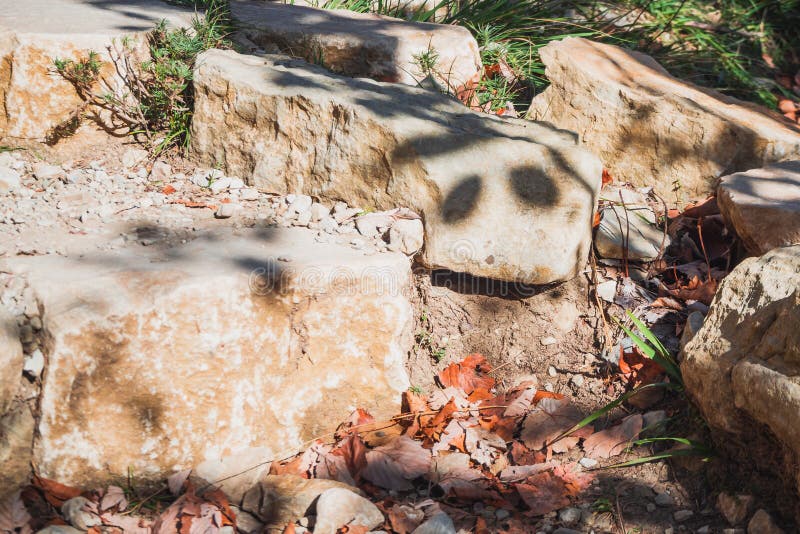 Mountain Trail Leading To the Summit. a Face Shadow on a Stone Made of ...