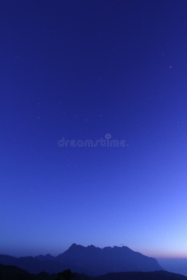 Mountain Under the Starry Deep Blue Night Sky Stock Image - Image of ...