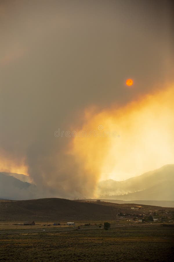 Mountain and Valley Landscape with Wildfire Smoke Obscuring the Sun ...
