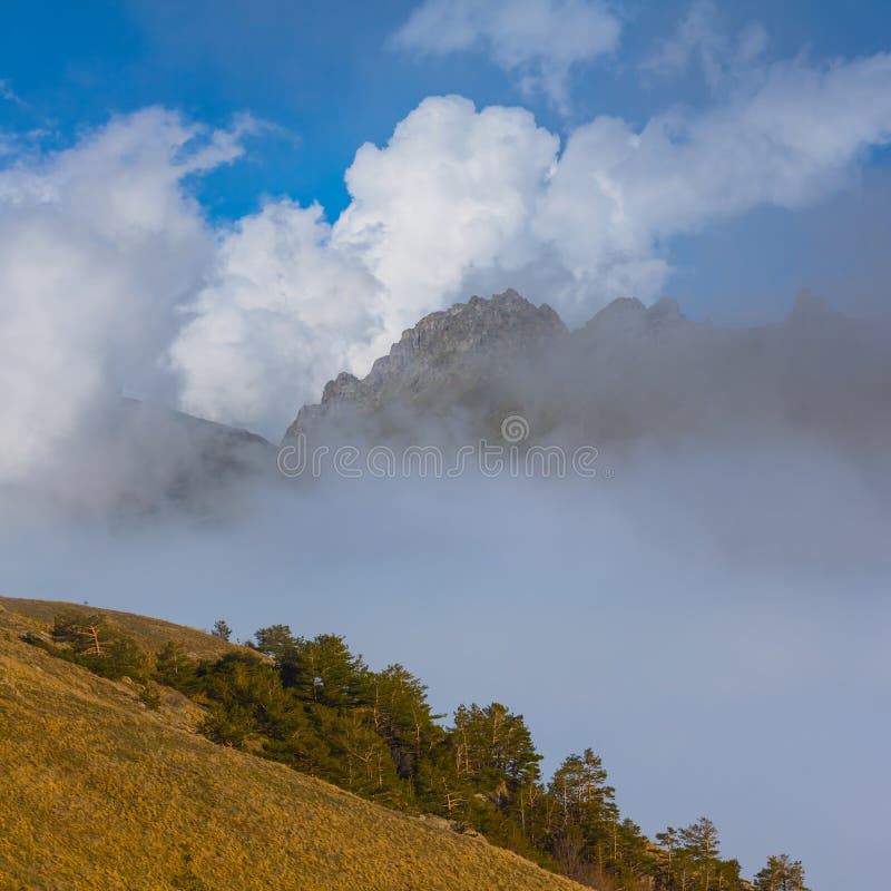 Mountain Valley in Mist and Clouds Stock Photo - Image of haze ...