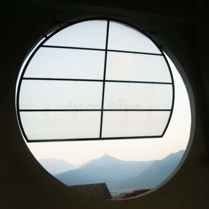 Mountain View through a Big Round Glass Window Stock Image - Image of ...