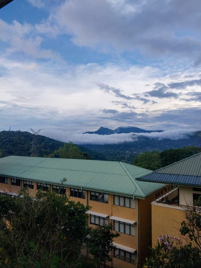 Mountain View with Building and Green Roof. Stock Photo - Image of ...