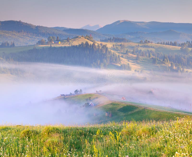Mountain Village in the Mist Stock Photo - Image of highland, color ...