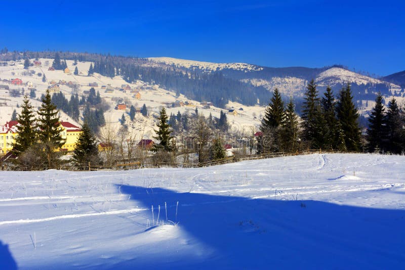Mountain Village in Snow Gully between the Mountains Stock Photo ...