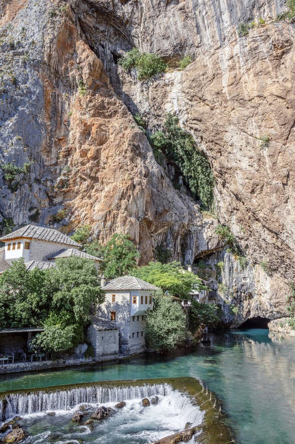 Mountain Water Spring with a Lake Under a Large Rock Stock Image ...