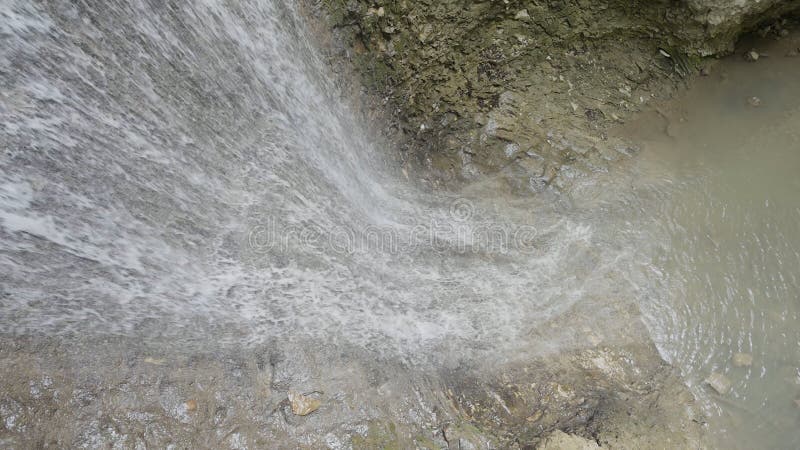 Mountain Waterfall. Action. Thin Streams with Drops of Water Run Over ...