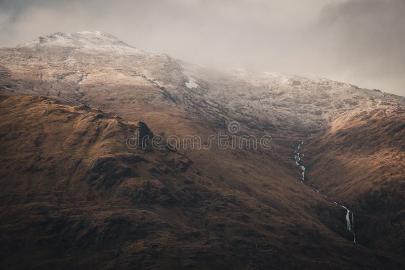 Mountain Waterfall Seen through the Mist in the Scottish Highlands ...