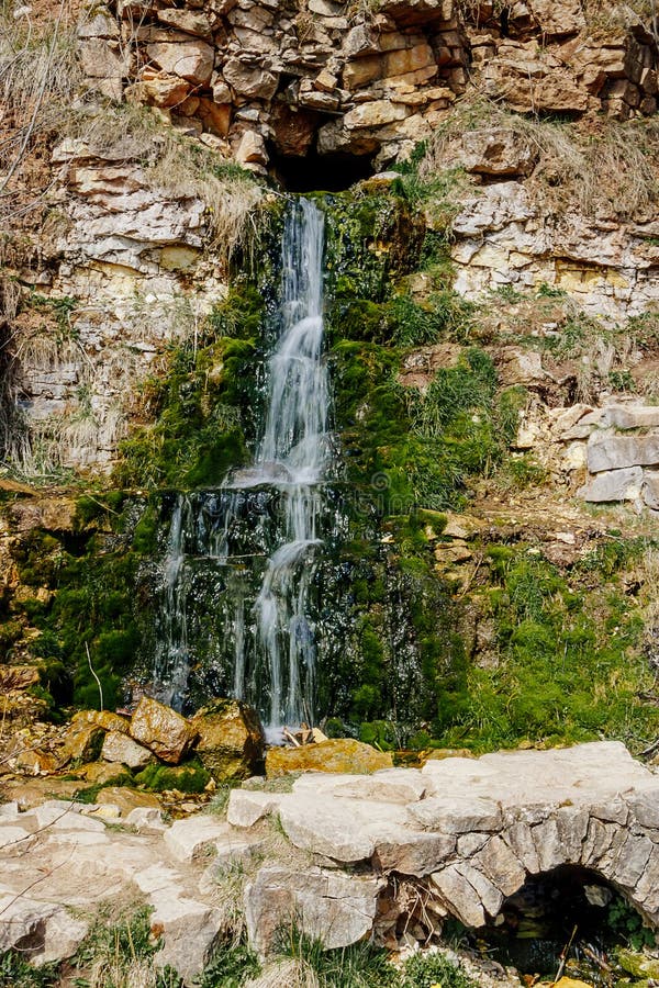 Mountain Waterfall among the Stones. a Source of Water in Arid Areas ...