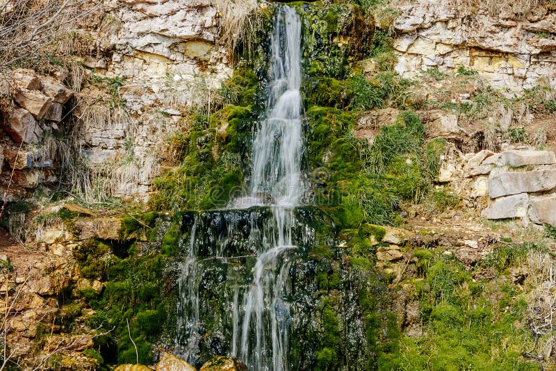 Mountain Waterfall among the Stones. a Source of Water in Arid Areas ...