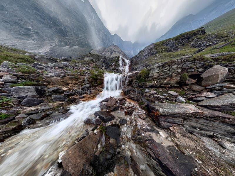 Mountain Waterfall Stream in Misty Rainy Weather in the Valley Flowers ...