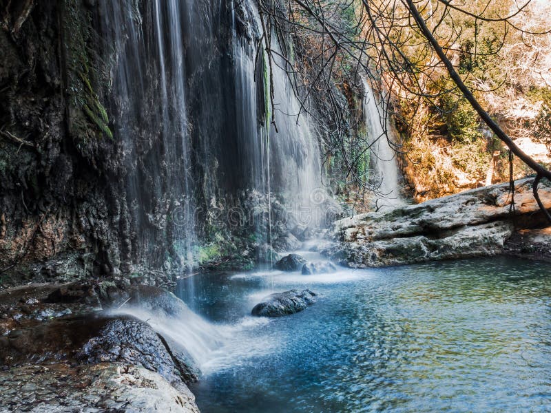 Mountain Waterfall. Water Flows Downstream from the Waterfall from the ...
