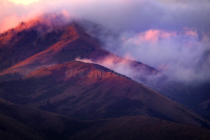 Mountain Wilderness with Clouds and Sunset Light Stock Photo - Image of ...