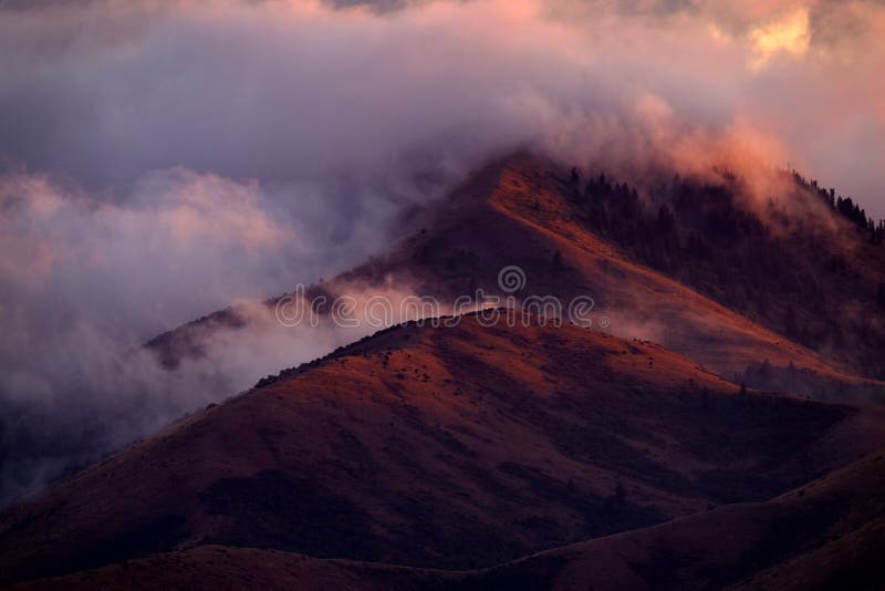 Mountain Wilderness with Clouds and Sunset Light Stock Image - Image of ...