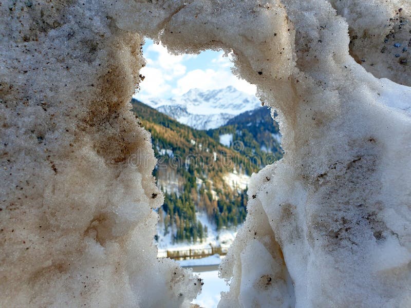 Mountain Winter Landscape through a Hole Made of Snow Stock Photo ...
