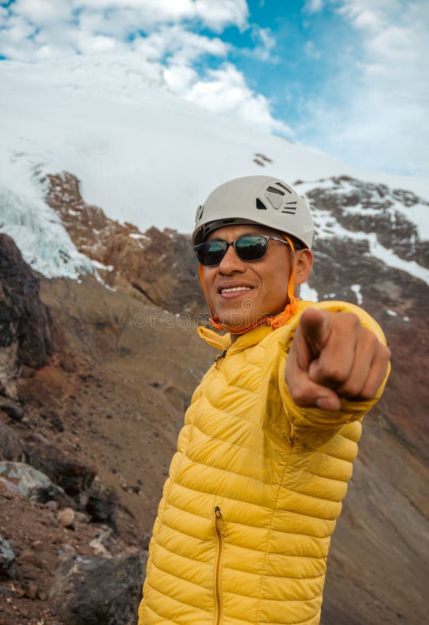 Mountaineer Looking at the Camera and in the Background the Cayambe ...