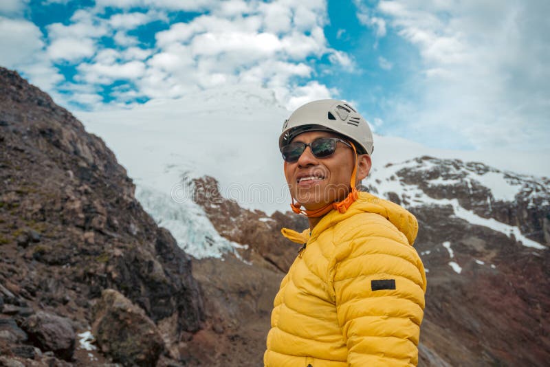 Mountaineer Looking at the Camera and in the Background the Cayambe ...
