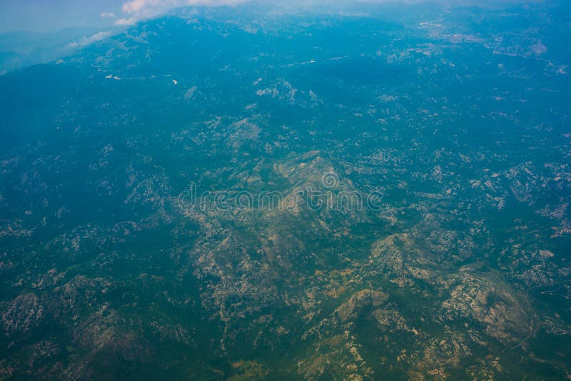 Mountainous and Hilly Terrain from an Airplane Flight Stock Photo ...