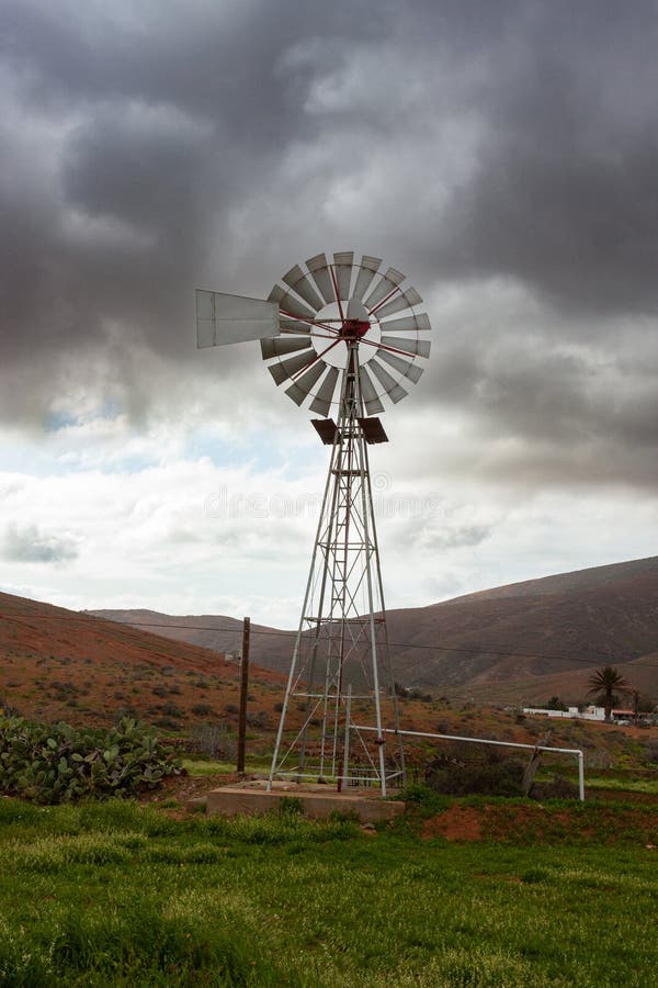 Landscape with Windmill for Water Extraction Stock Photo - Image of ...
