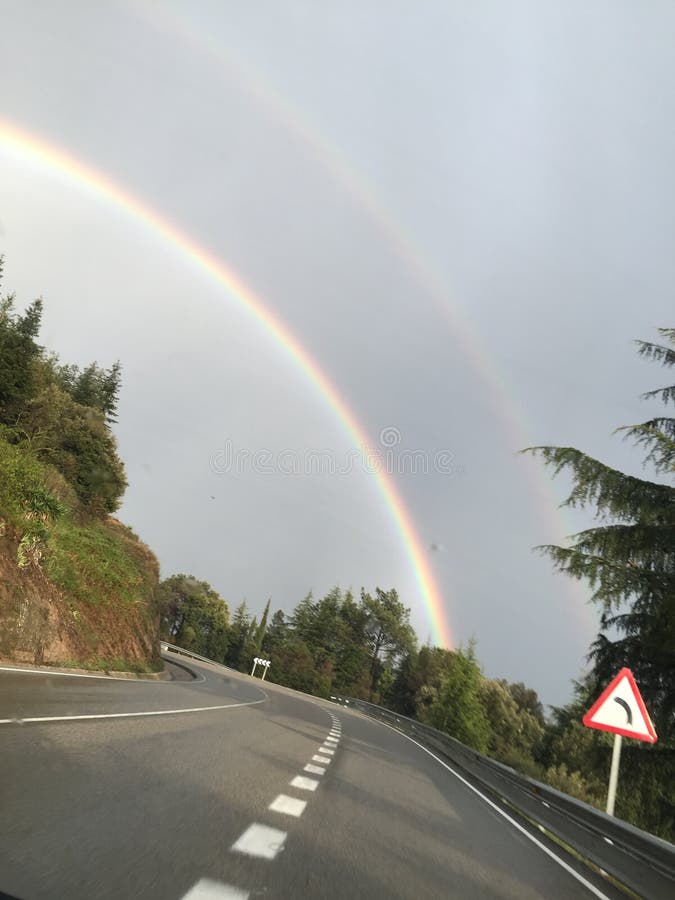 The Rainbow Marks the Road, Road, Curve Stock Image - Image of ...