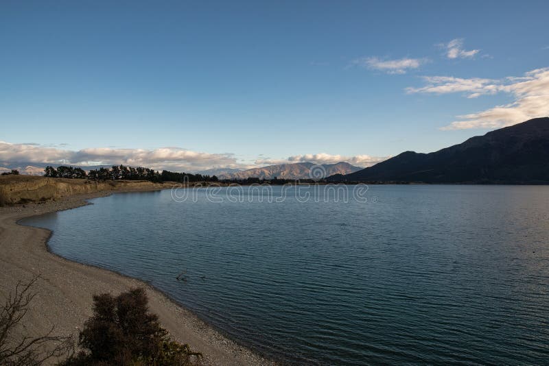 Lake Scenery Around the Shores of Alpine Lake Hawea Stock Image - Image ...
