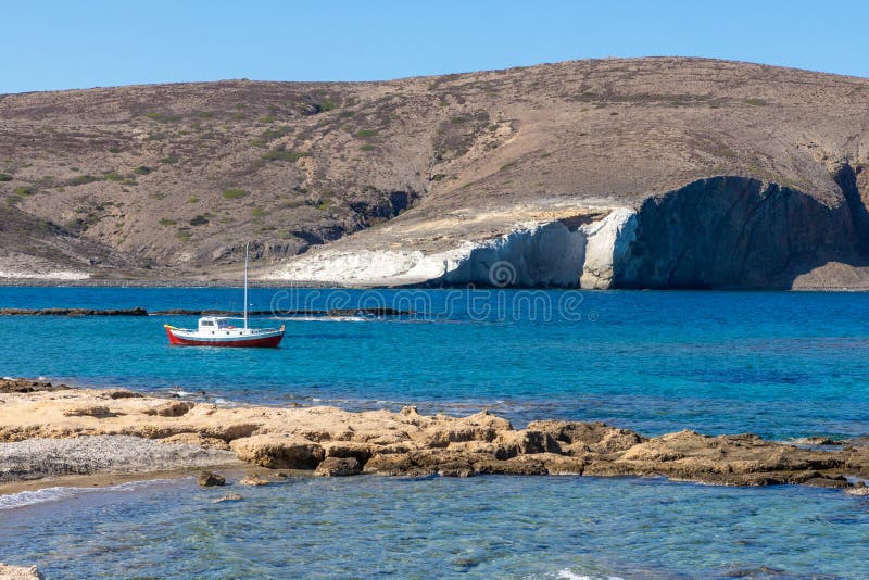 Mountains and Boat in Pollonia Beach Editorial Stock Photo - Image of ...
