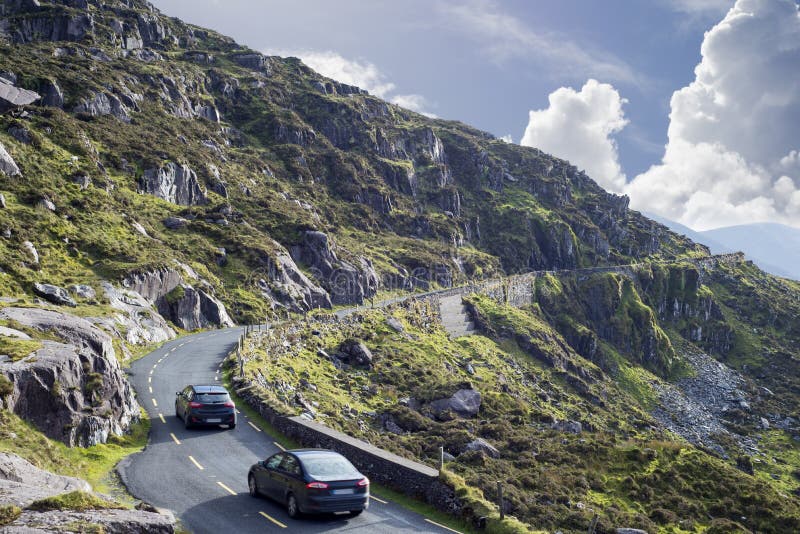 Mountains and Cliff Road Traffic at the Conor Pas Stock Image - Image ...