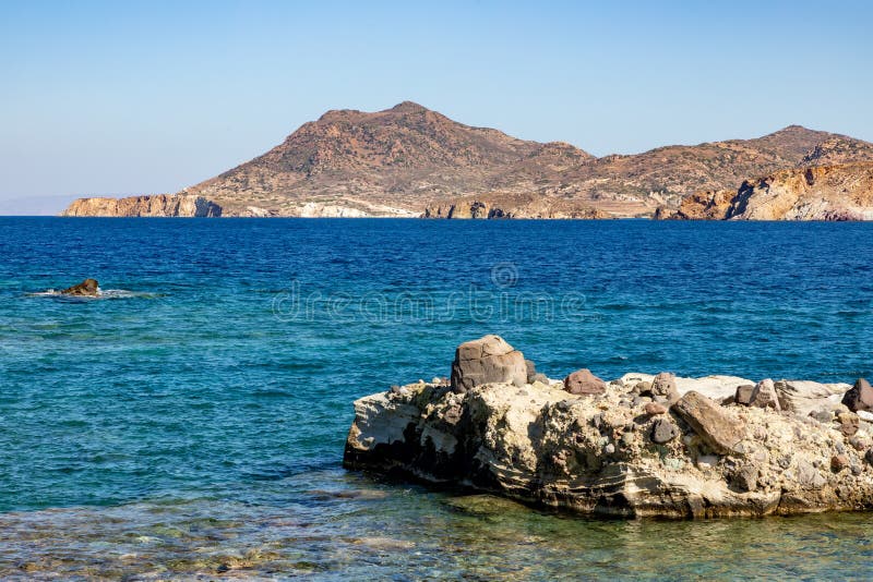 Mountains and Cliffs in Pollonia Beach Stock Photo - Image of ocean ...