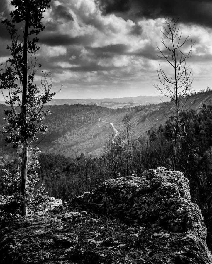 Mountains with a Distant Path Going Up the Hill Stock Image - Image of ...