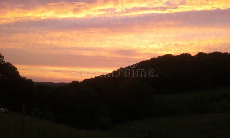 Sunset stock photo. Image of mountains, sunset, farm - 117971150