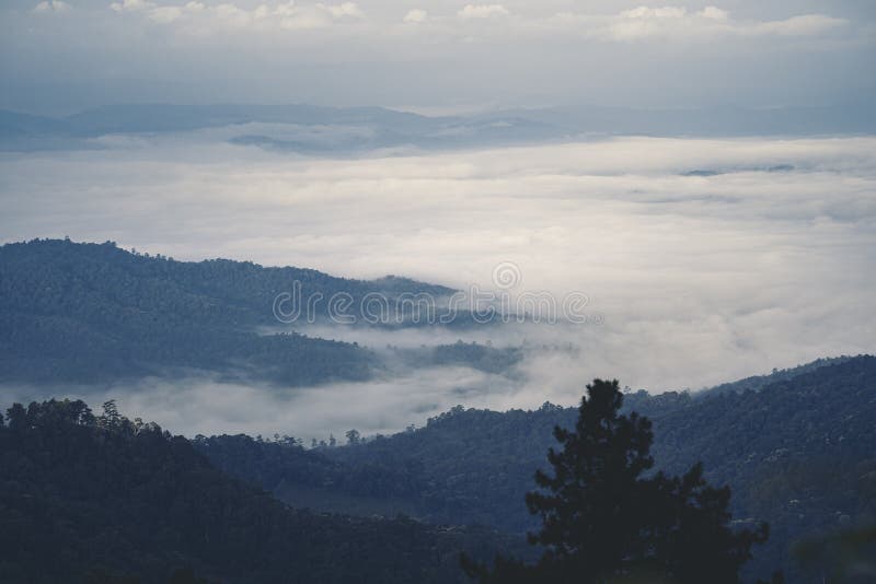 Mountains and Fog in the Early Morning Hours Stock Image - Image of ...