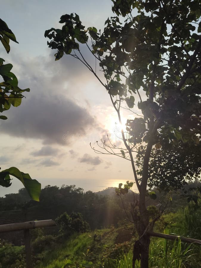 Mountains, Forests, Clouds and the Sun in the Afternoon Stock Image ...