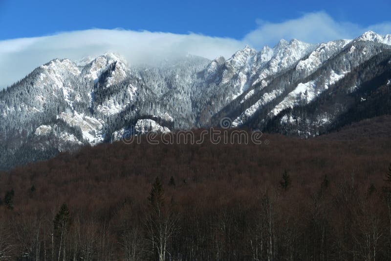 Mountains Full of Snow with the Tops in the Clouds Stock Photo - Image ...