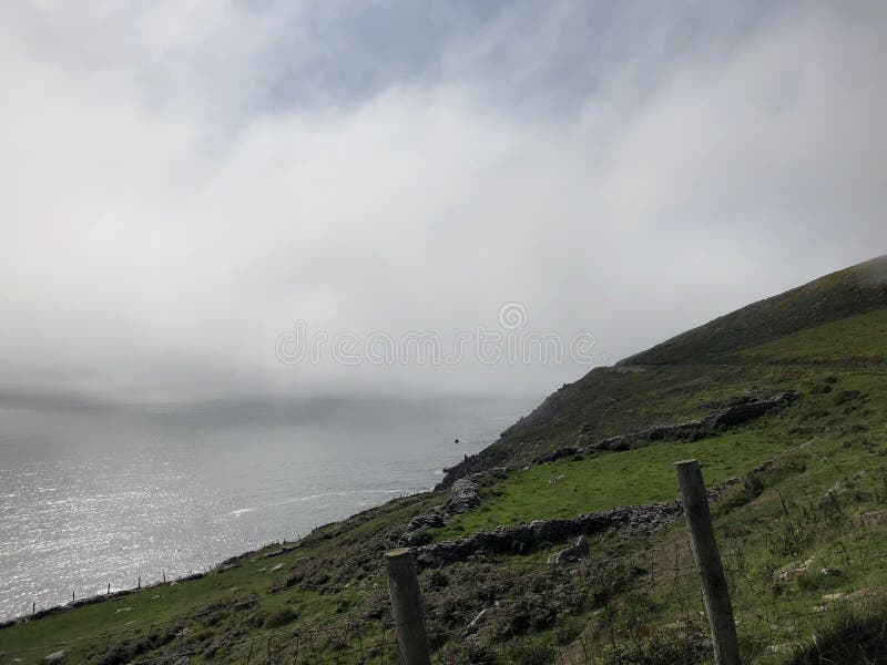 Mountains in Ireland Coastline with Mist Stock Photo - Image of pasture ...