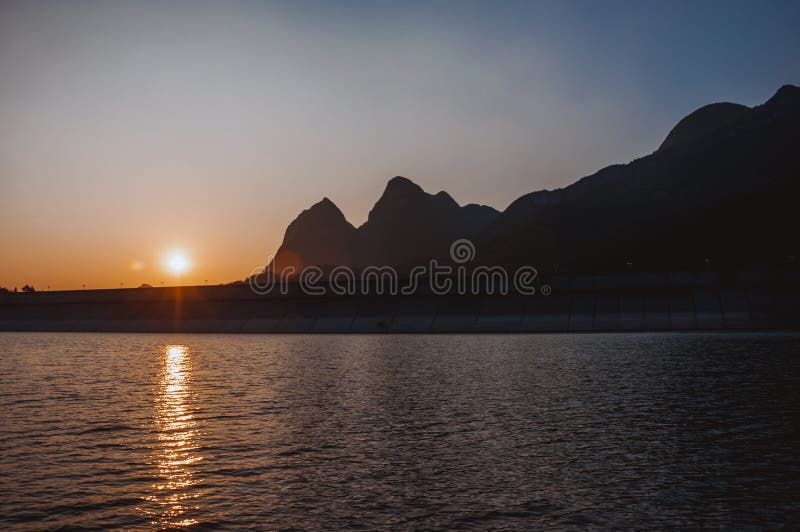 The Mountains and Lake Scenery in Sunset Stock Image - Image of scenery ...
