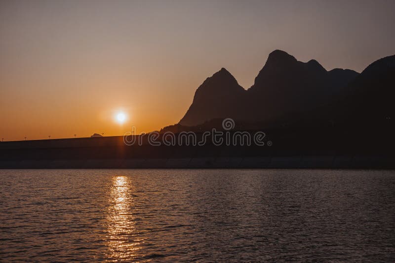 The Mountains and Lake Scenery in Sunset Stock Photo - Image of scenery ...