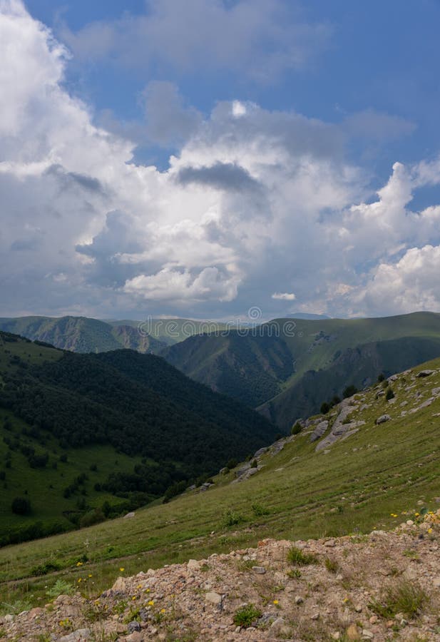 In the Mountains, Low Rain Clouds Create Beautiful Patterns in the Sky ...