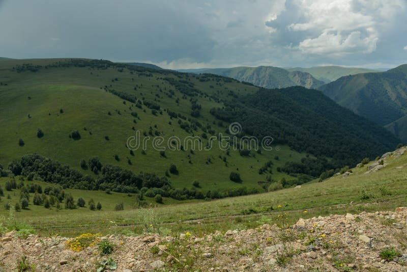 In the Mountains, Low Rain Clouds Create Beautiful Patterns in the Sky ...