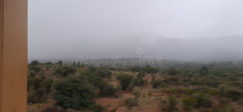 Mountains mist scenes stock photo. Image of mountains - 231432220