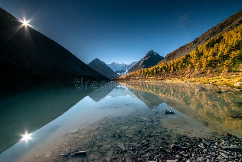 Mountains at Night with the Moon with Reflection in the Lake Stock ...