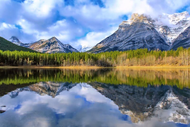 Mountains Reflecting into the Lake Stock Image - Image of symmetrical ...