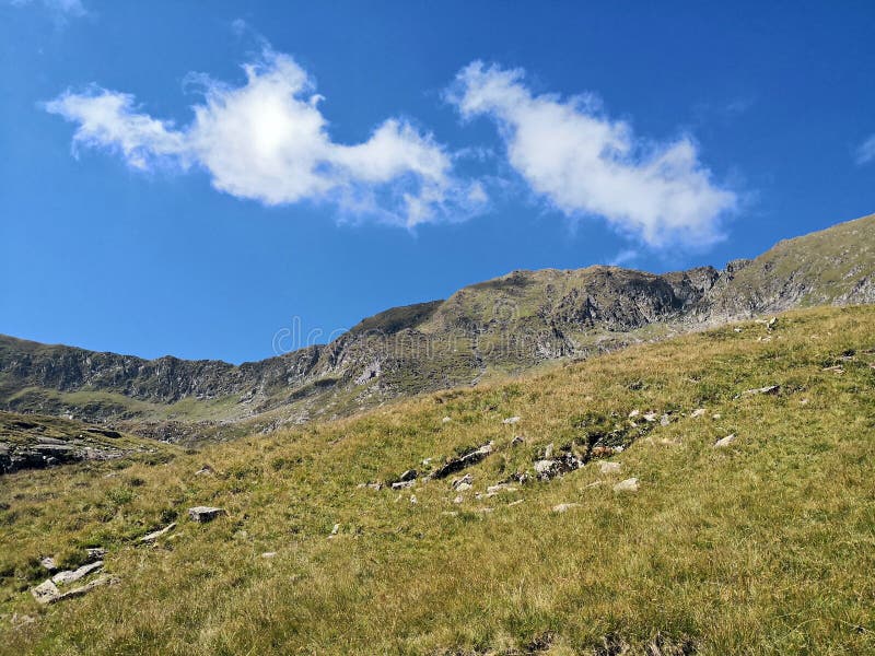 Mountains Ridge Under Blue Sky Stock Photo - Image of mountaineering ...
