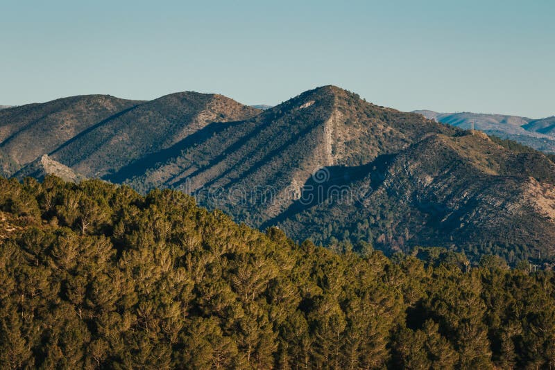 Mountains with Tree Line in Foreground in Spain Stock Photo - Image of ...
